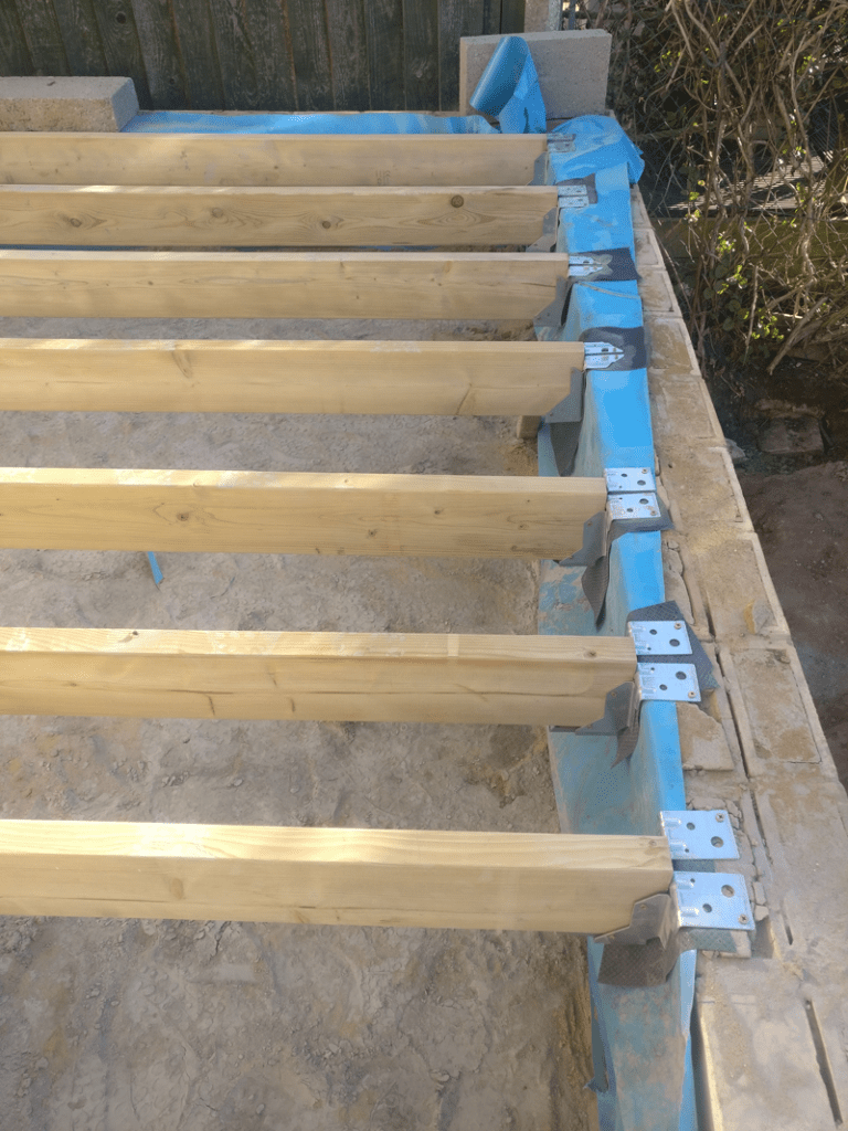 Single story extension floor joists being installed - Complete loft ...