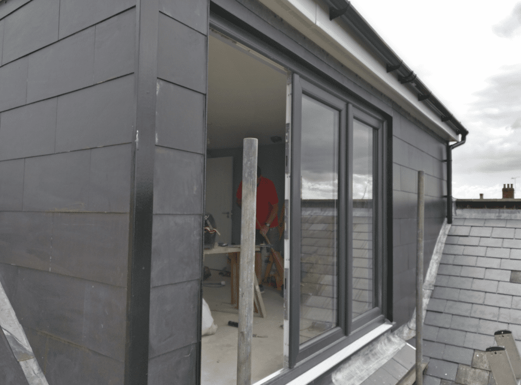 Loft showing slide and food doors - Complete loft conversions Suffolk ...