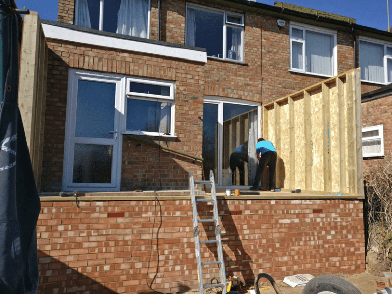 Single story extension timber frame being erected - Complete loft ...